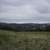 Overlapping hill landscape with mountains in the background in Helena ...